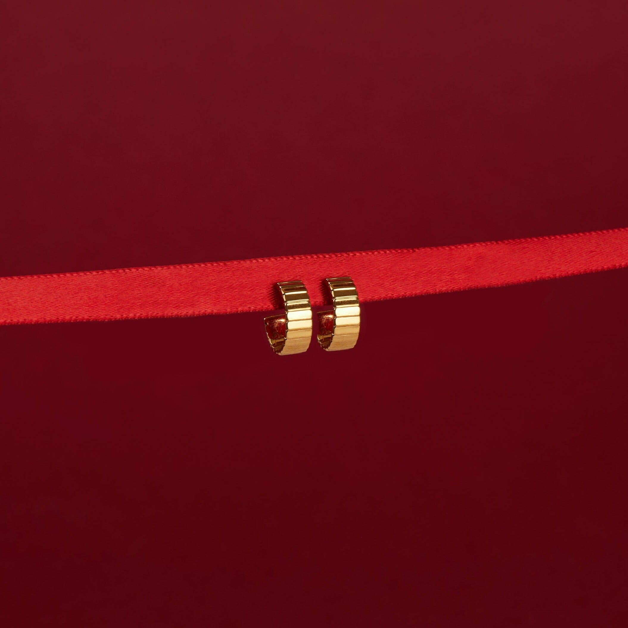 Infinity Huggie Earrings in Yellow, Rose or White Gold